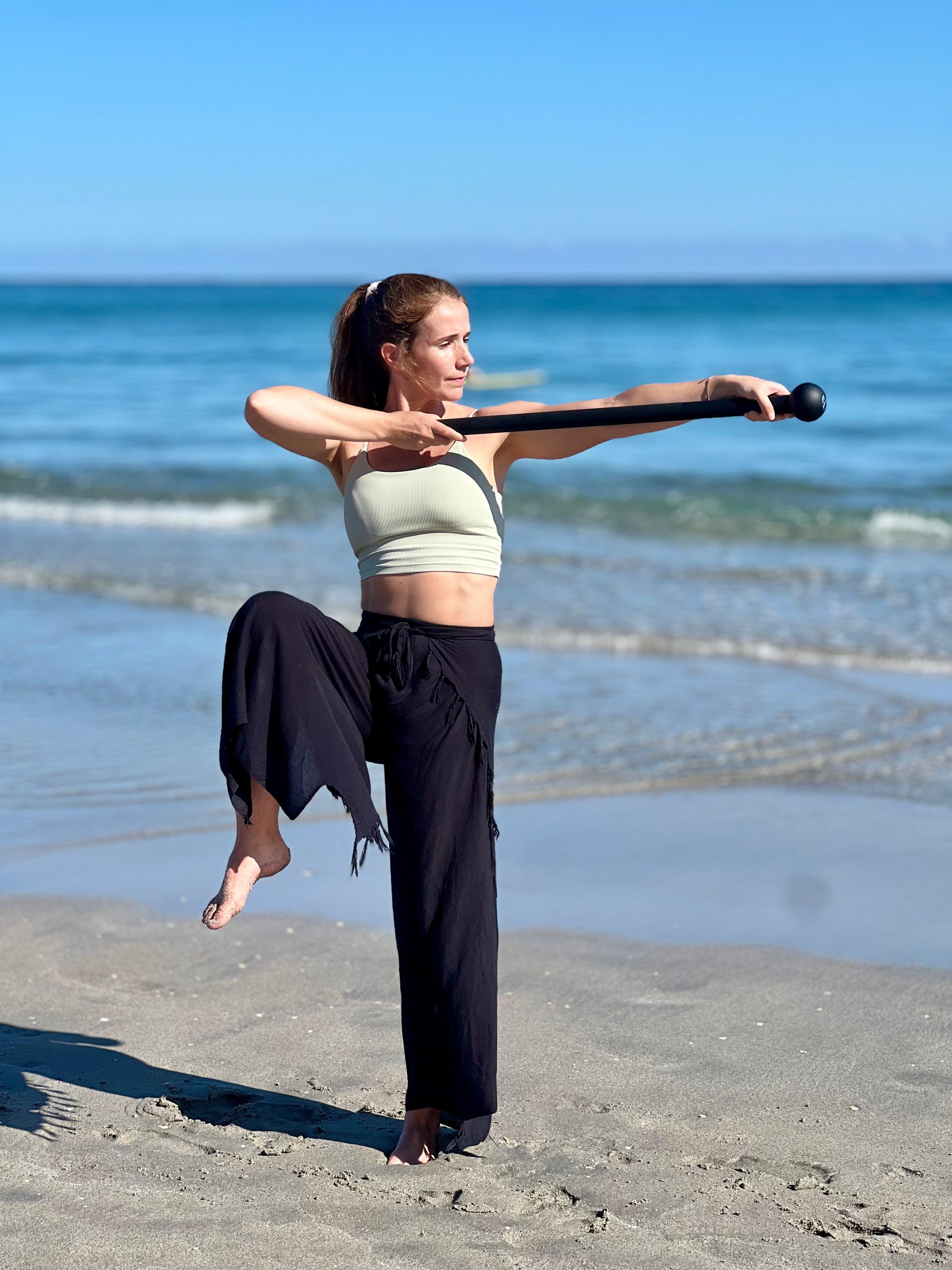Reconnect with Your Strength through Steel Mace Vinyasa – Rose Boreal